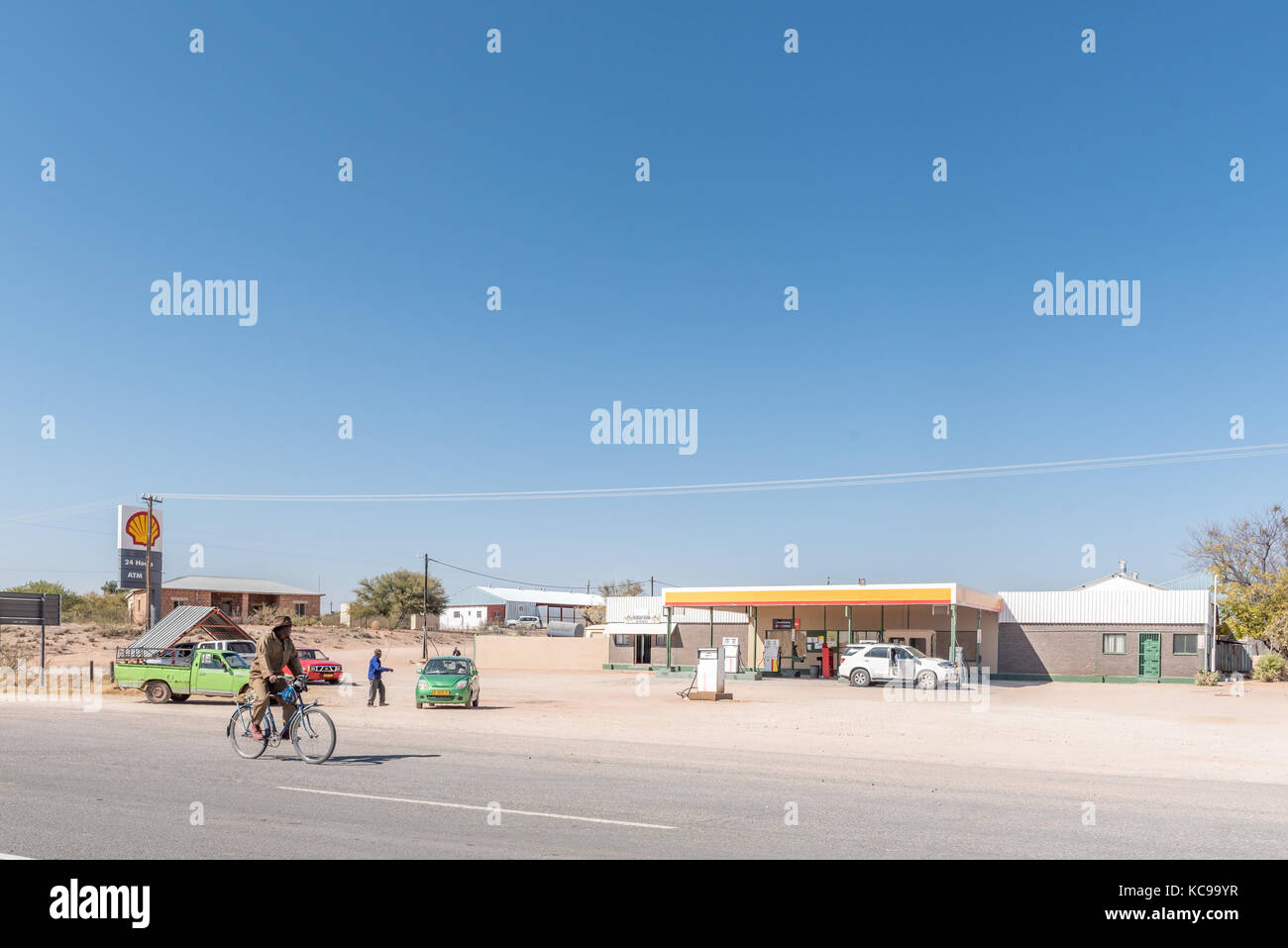 STAMPRIET, NAMIBIA - JULY 5, 2017: A street scene with gas station and ...