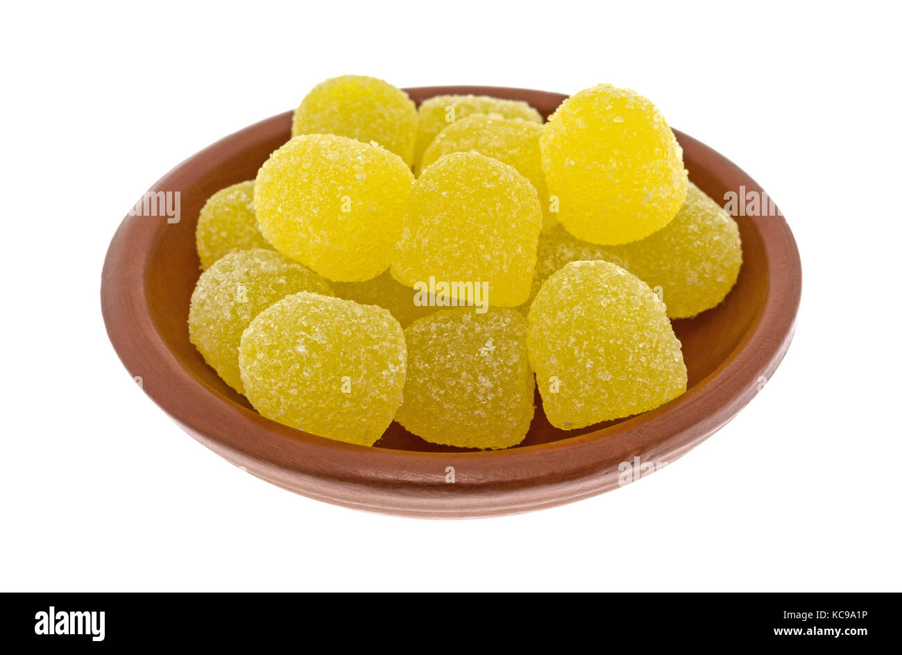 Lemon drop candy hi-res stock photography and images - Alamy