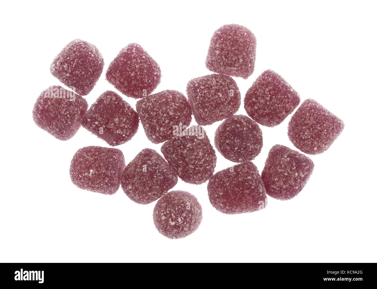 Top view of purple grape flavored sugar coated sour drop candy isolated ...