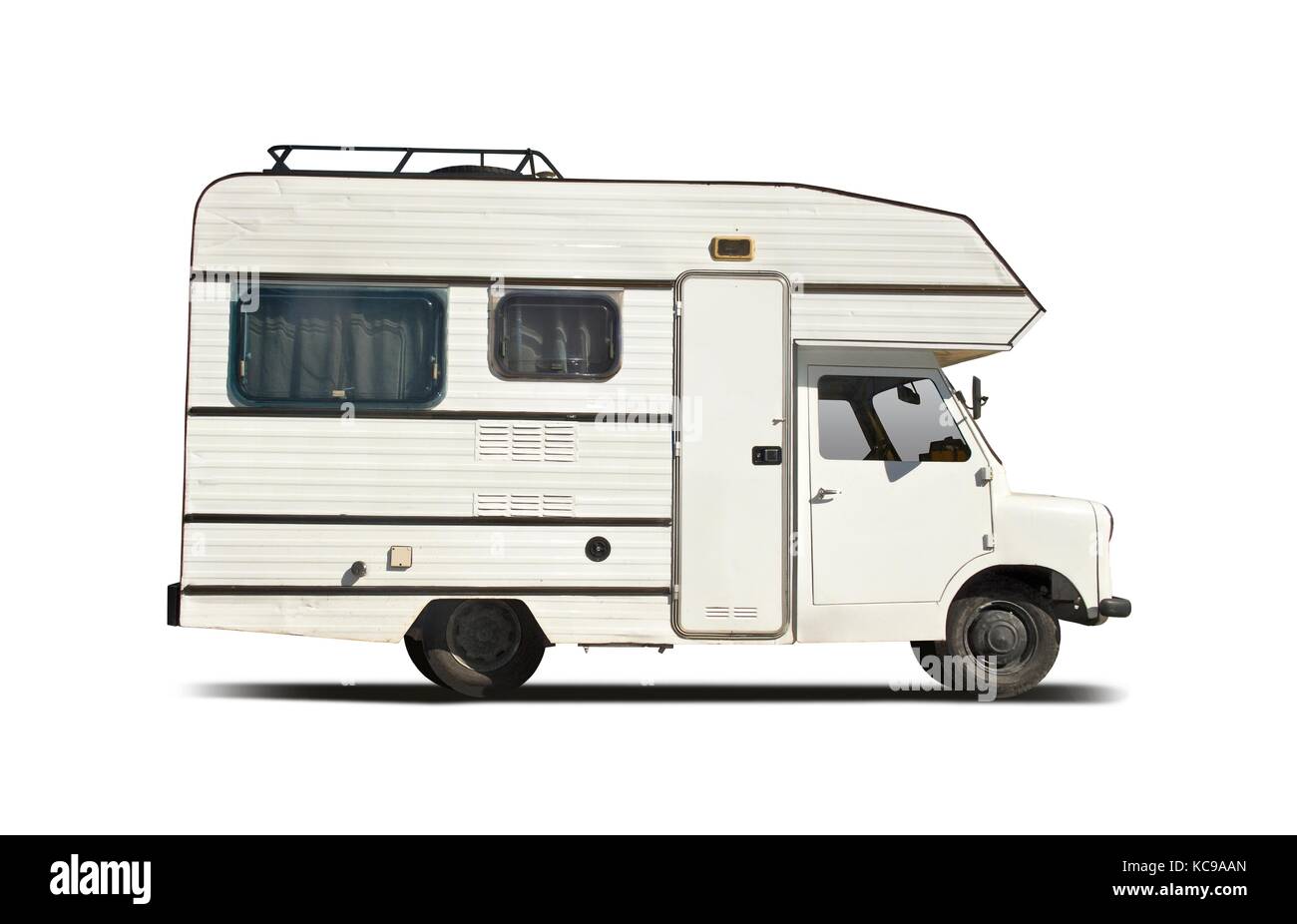 old motorhome side view isolated on white Stock Photo - Alamy