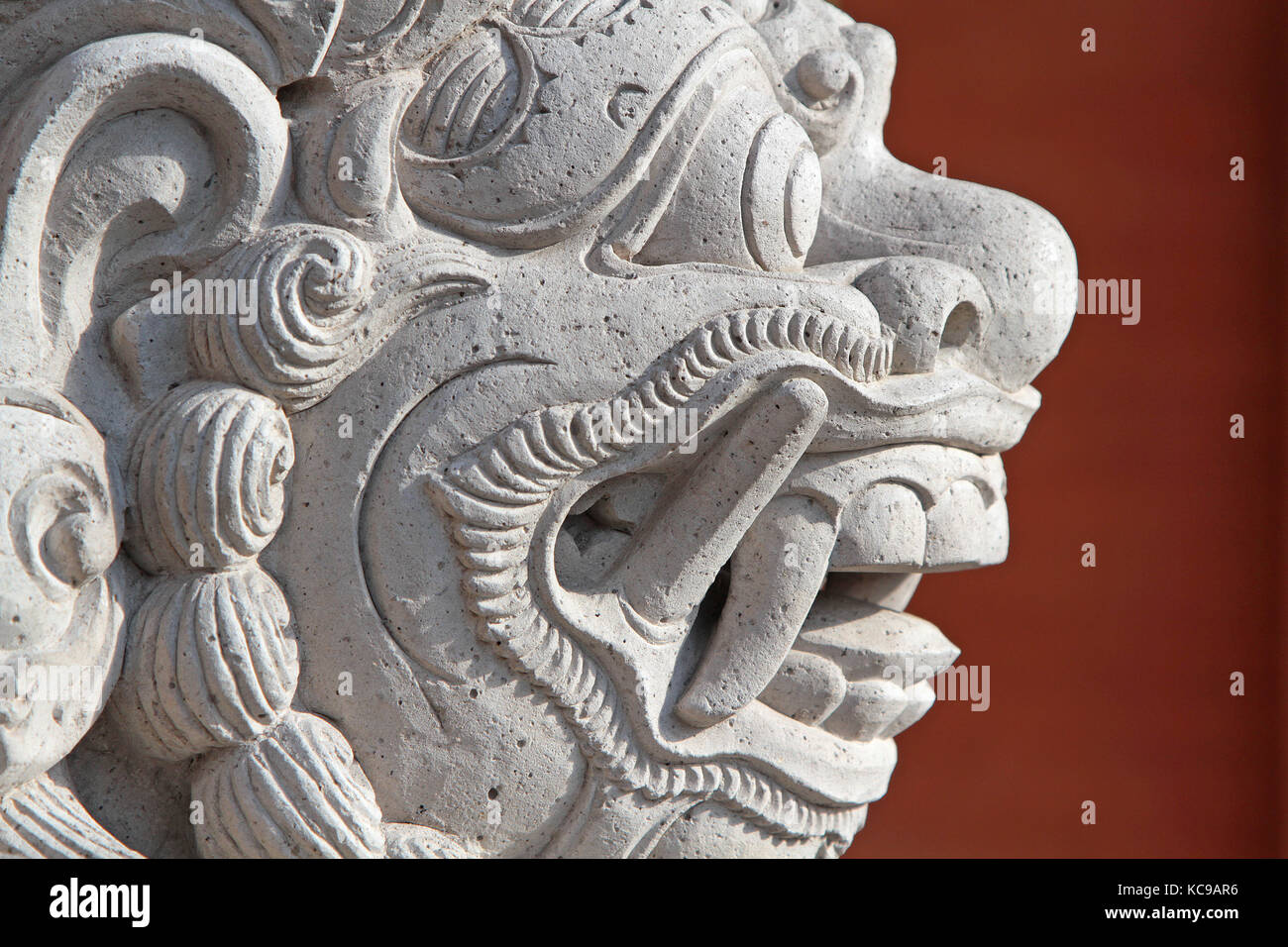 Stone head in Ubud palace, Bali Stock Photo - Alamy