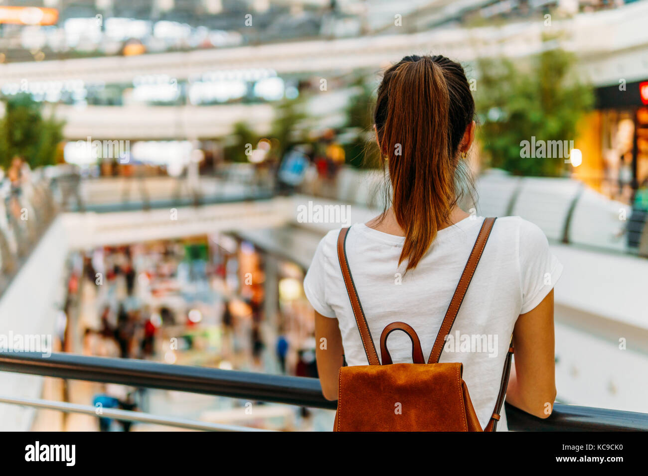 Young Woman Exploring Modern Shopping Mall Stock Photo - Alamy