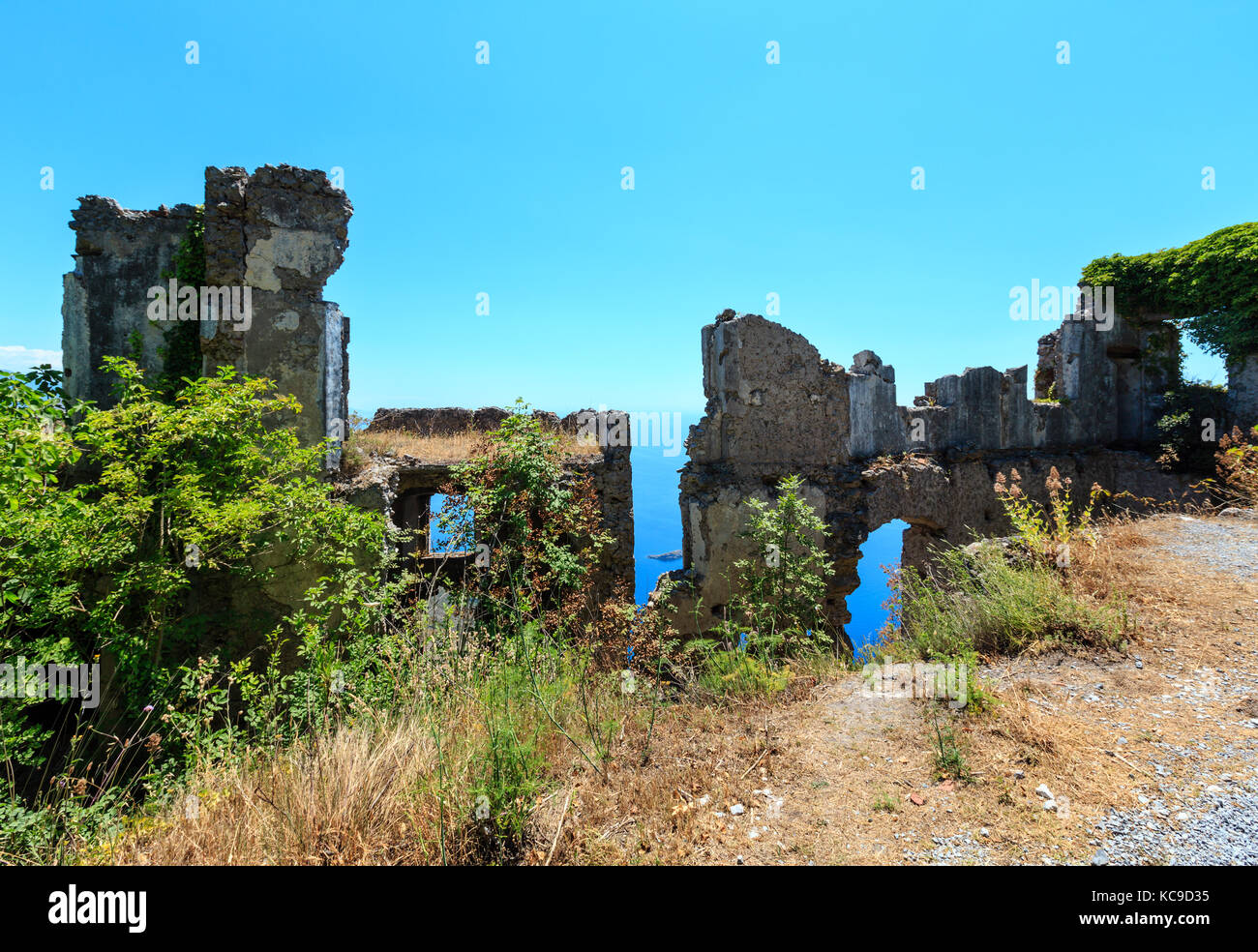 The ruins of the original settlement of Maratea on a rocky escarpment ...