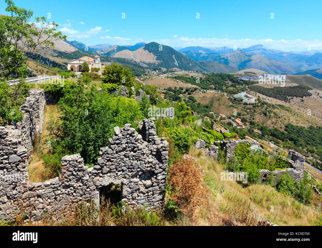 The ruins of the original settlement of Maratea on a rocky escarpment ...