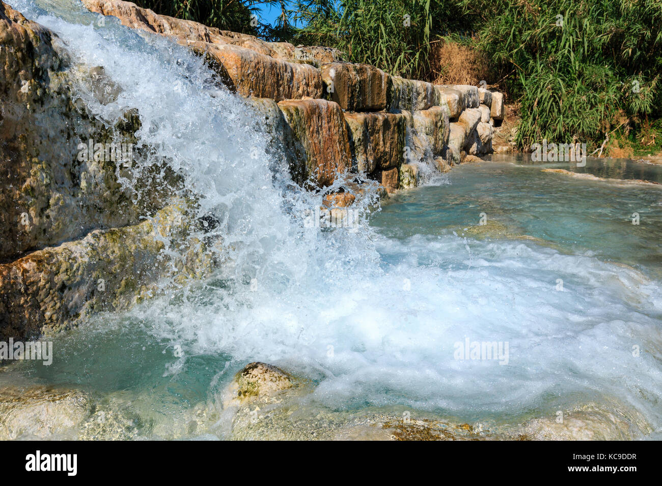 Natural spa with waterfalls and hot springs at Saturnia thermal baths ...