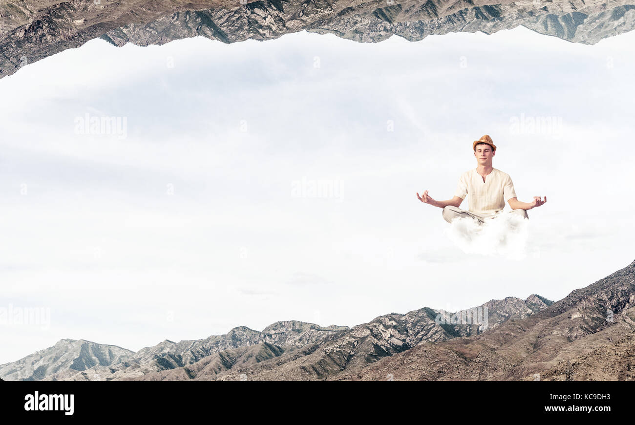 Young man keeping mind conscious Stock Photo - Alamy