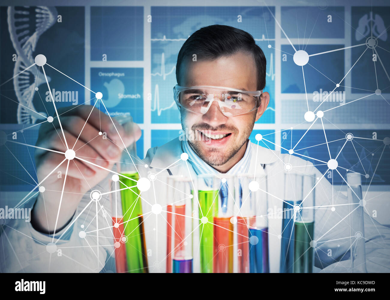Portrait of concentrated male scientist working with reagents in laboratory Stock Photo - Alamy