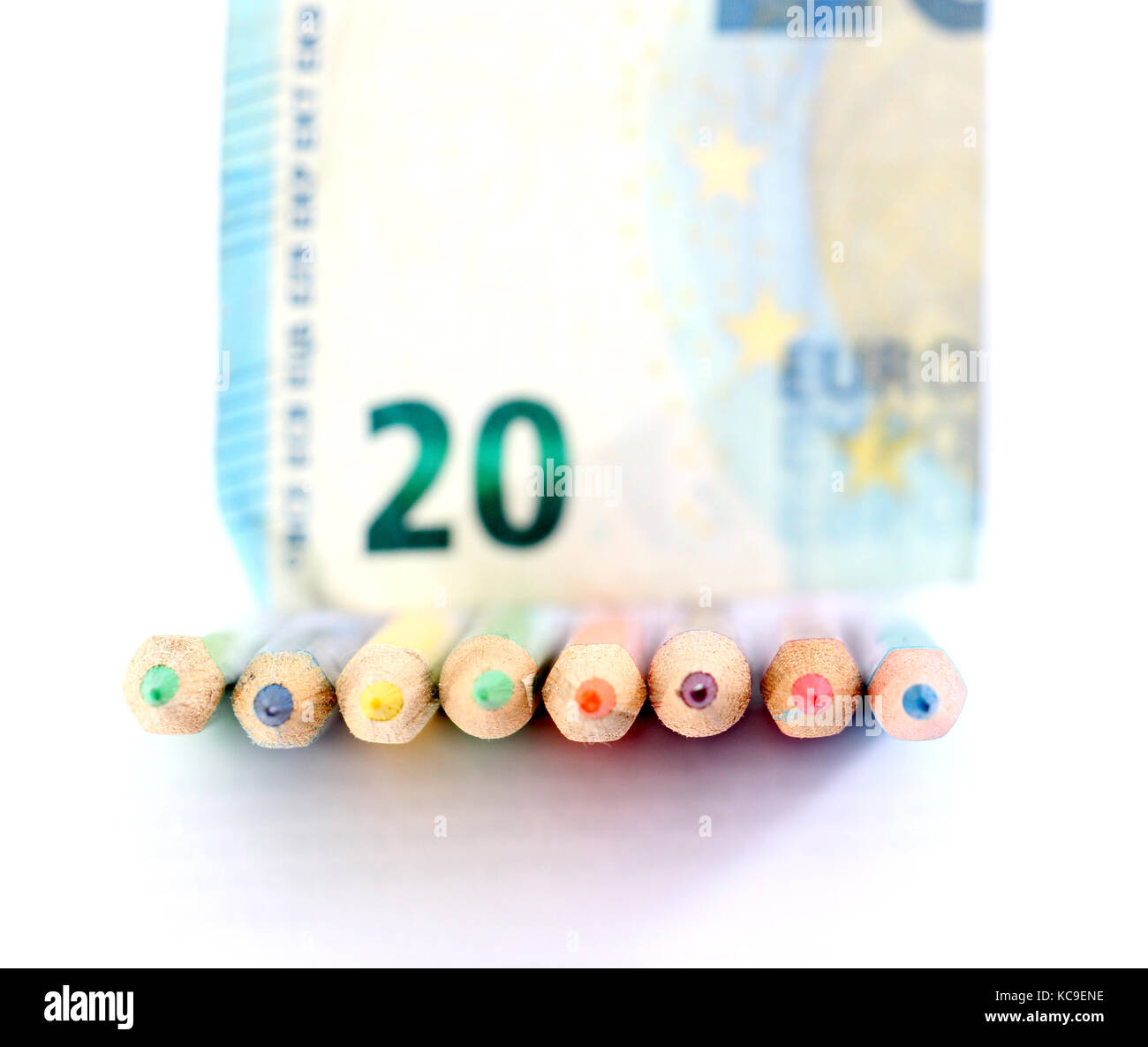 Color pencils and euro banknote on white background, shallow dof Stock ...