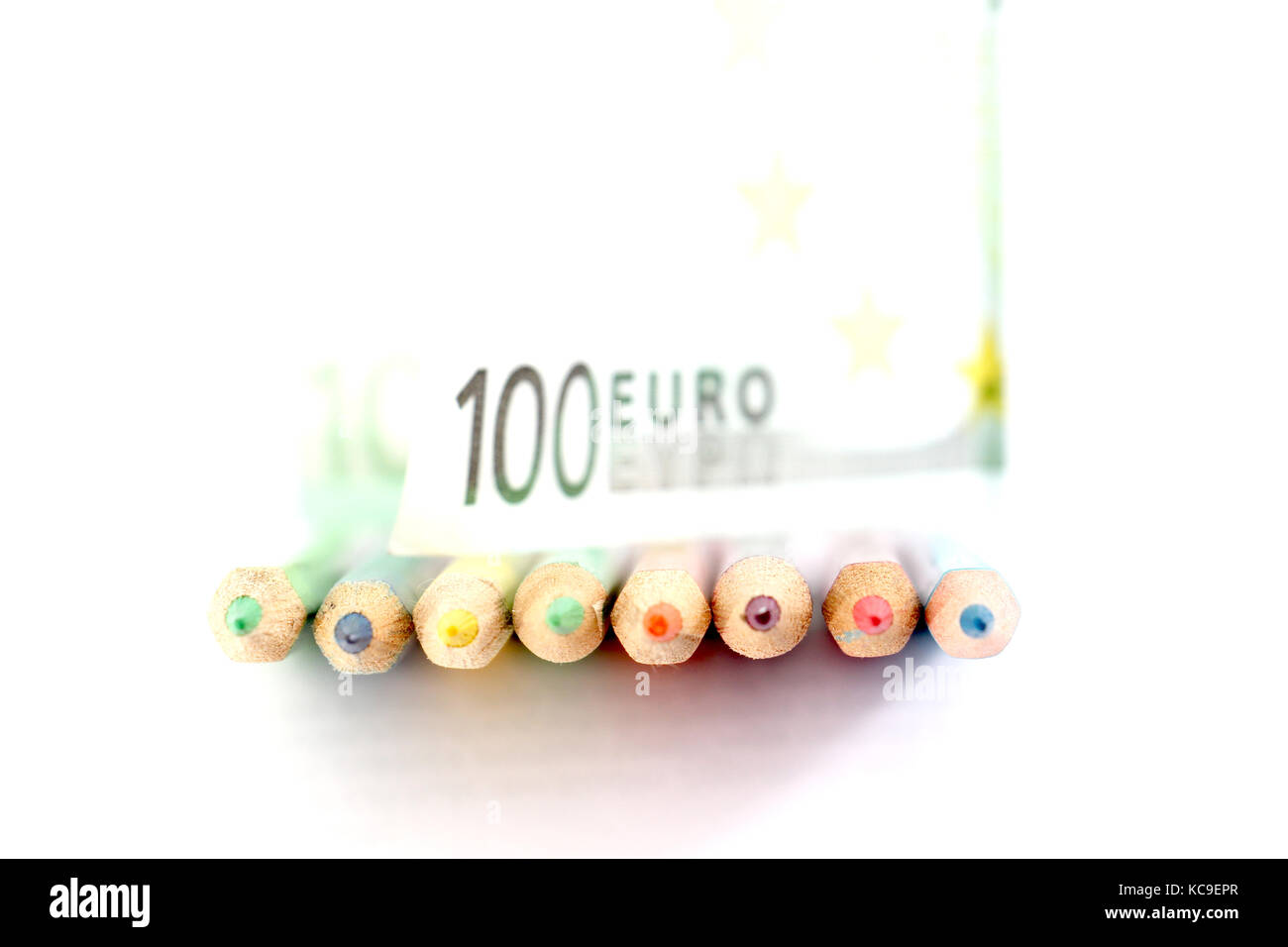 Color pencils and euro banknote on white background, shallow dof Stock ...