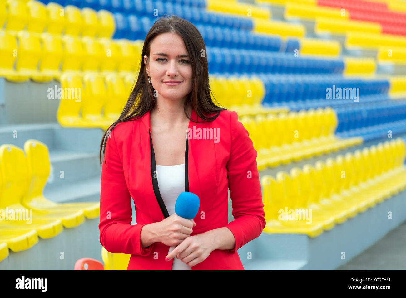 Young girl TV reporter is broadcasting Stock Photo - Alamy