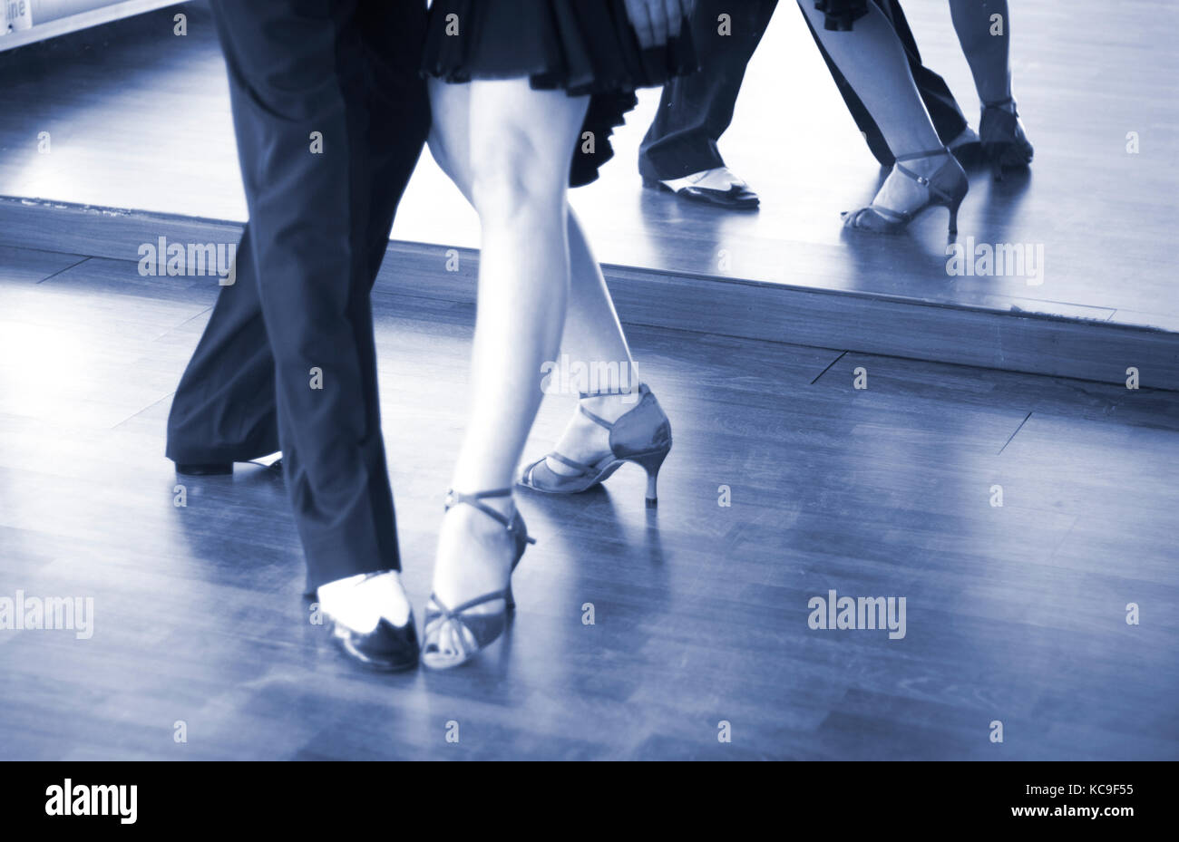 Ballroom dance couple of dancers and teachers in studio school dancing ...