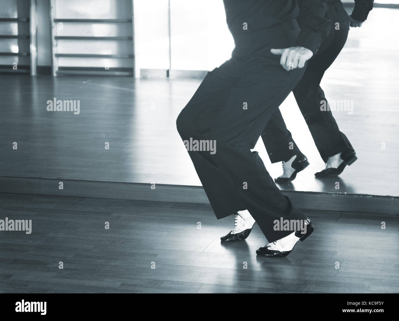 Ballroom dance male dancer and teacher in studio school dancing in ...