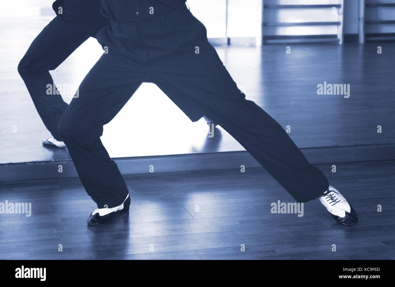 Ballroom dance male dancer and teacher in studio school dancing in ...