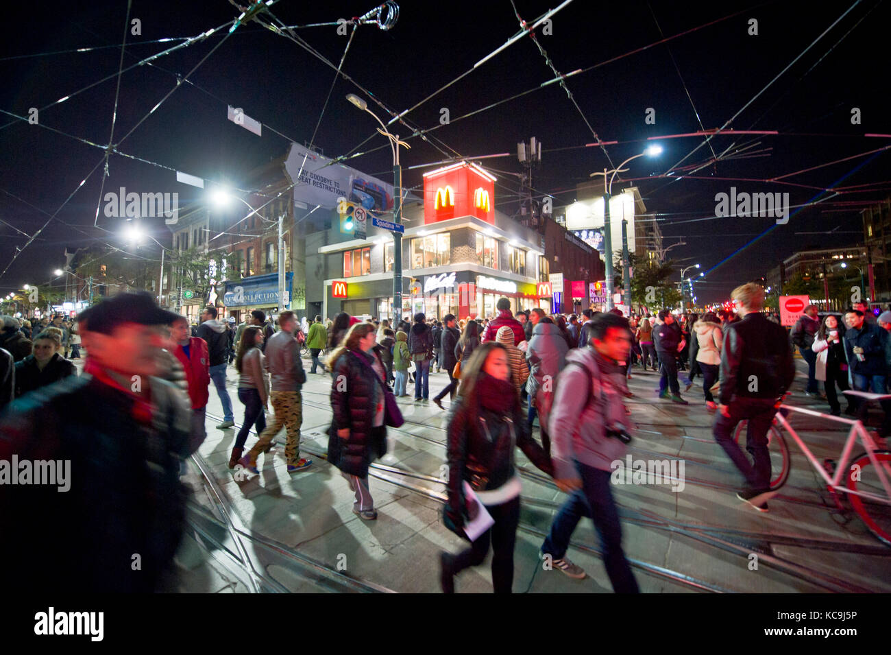 Crowd on Toronto streets during Nuit Blanche festival of contemporary ...
