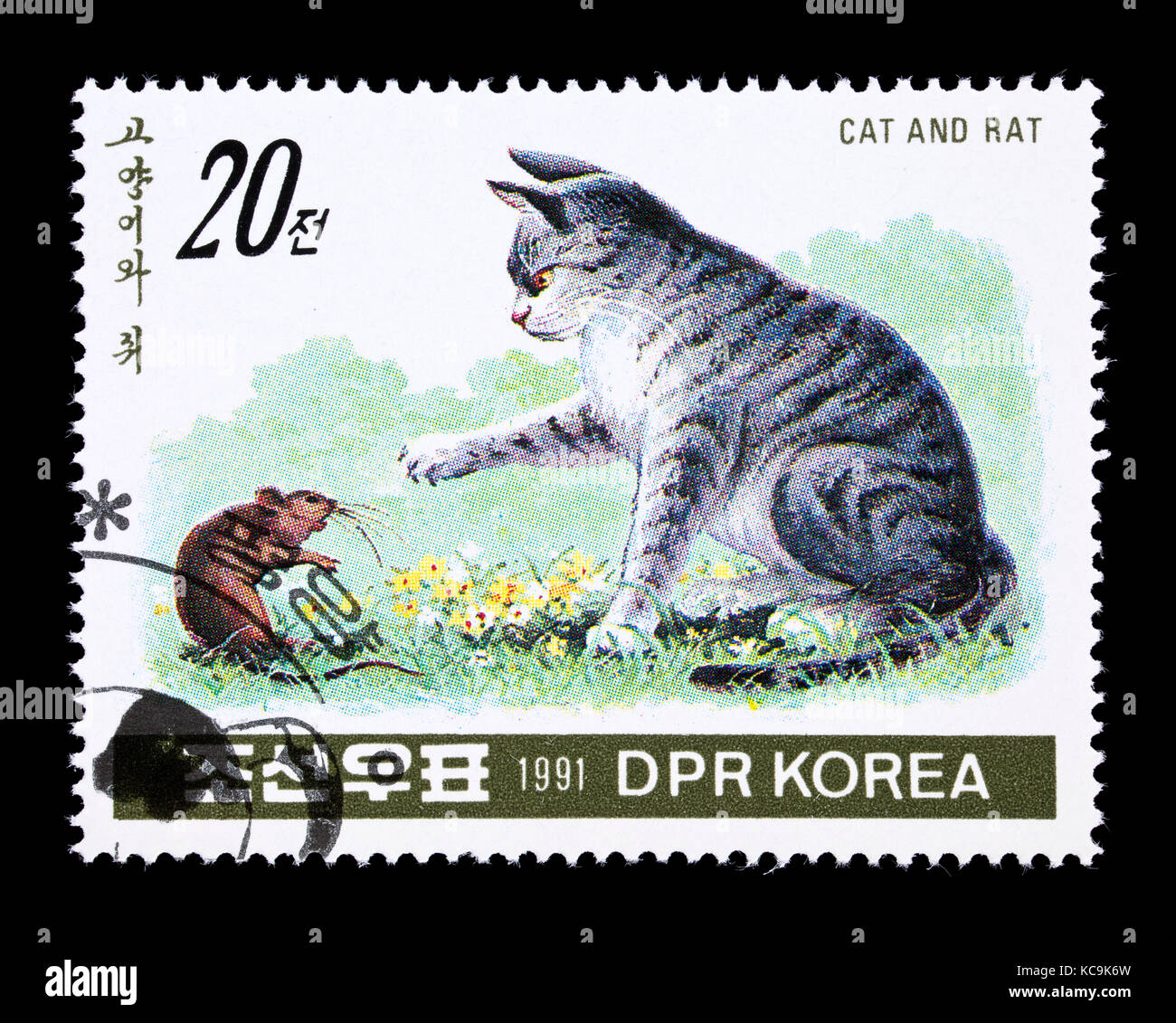 Postage stamp from North Korea depicting a kitten and a rat Stock Photo ...