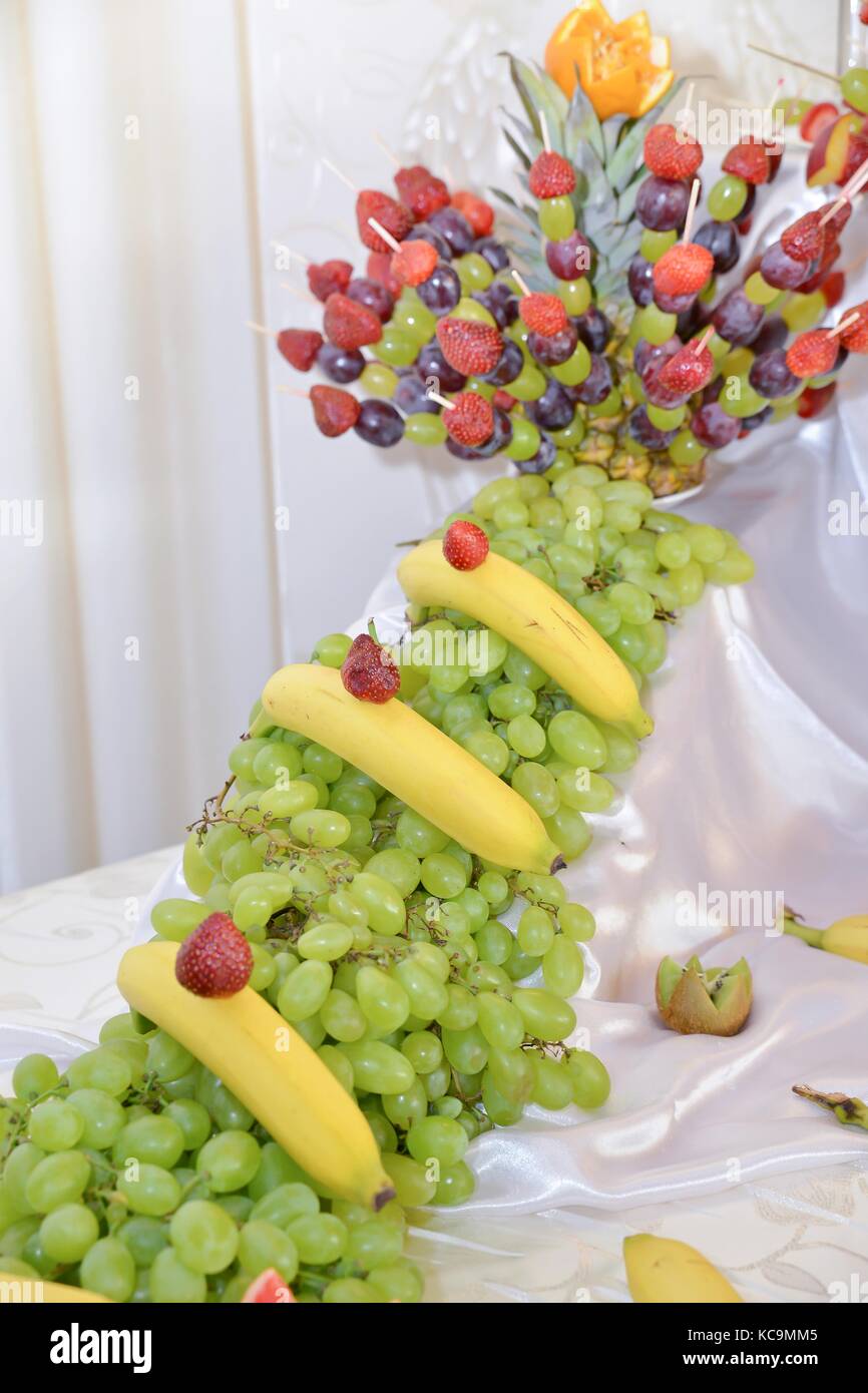 delicious fruits arranged on the table for wedding reception Stock ...