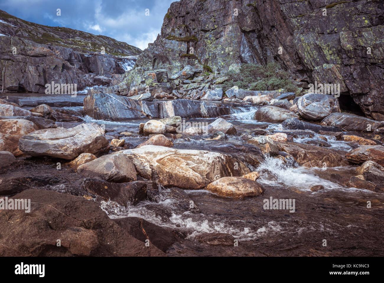 east agder high road in norway near valle with waterfalls and big rocks ...