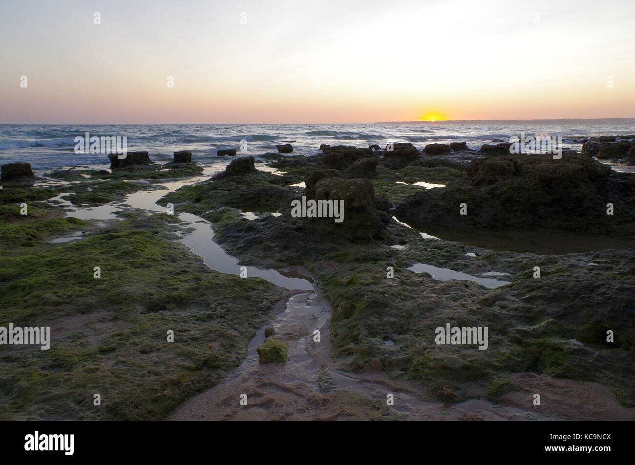 Sunset in Gale Beach. Albufeira, Algarve Stock Photo - Alamy