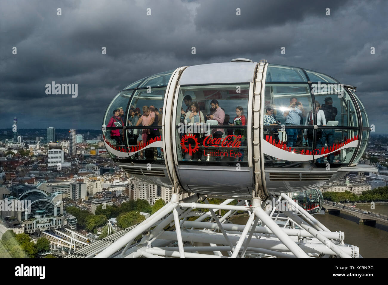 Capsule London Eye with people above London Stock Photo - Alamy