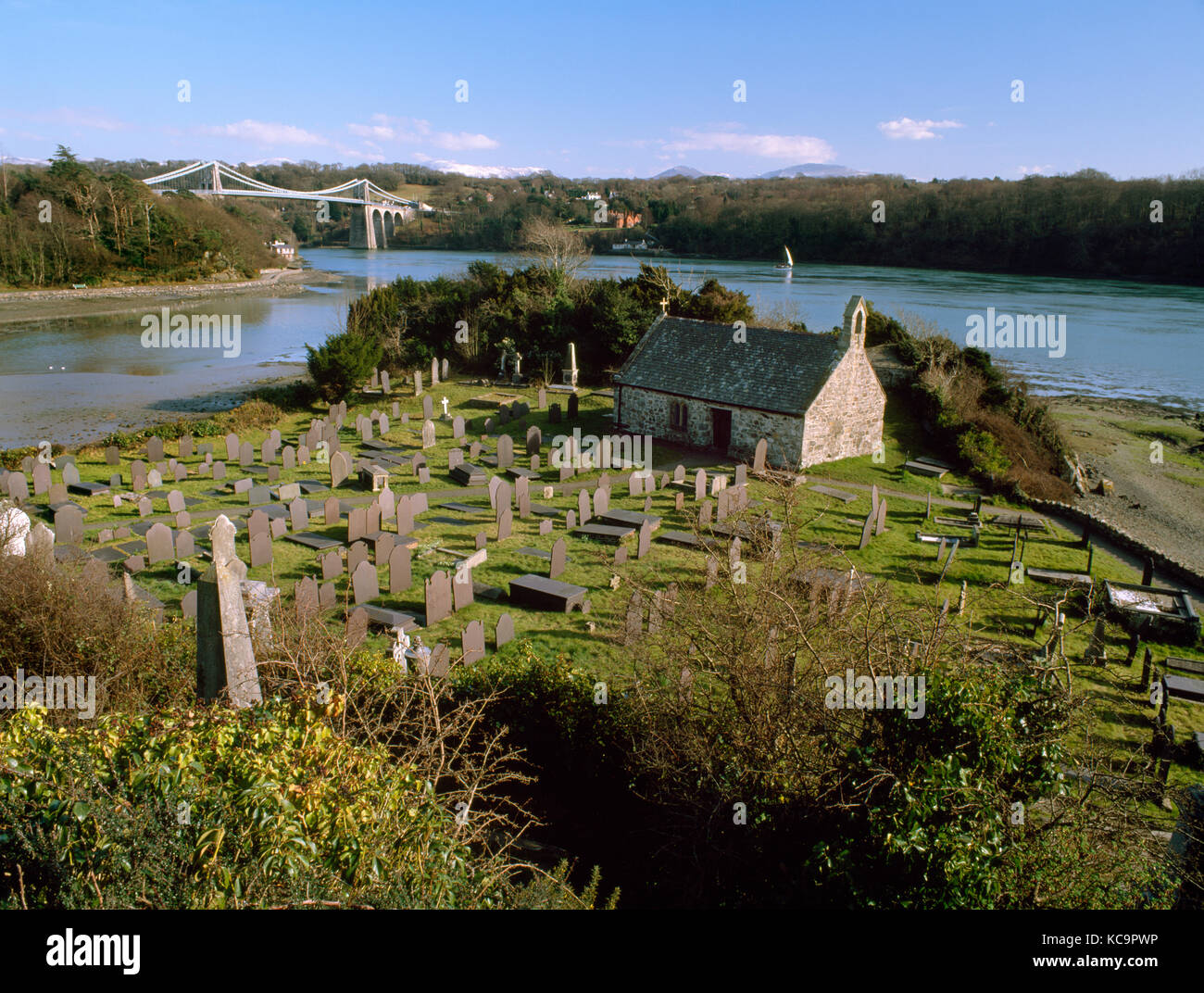 St Tysilio's church and graveyard on Church Island in the Menai Strait ...