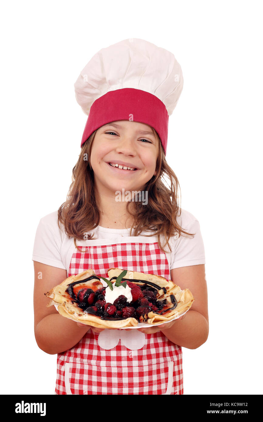happy little girl cook hold crepes filled with fruits Stock Photo - Alamy