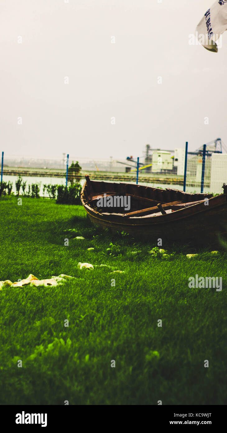 Boat on a grass Stock Photo - Alamy