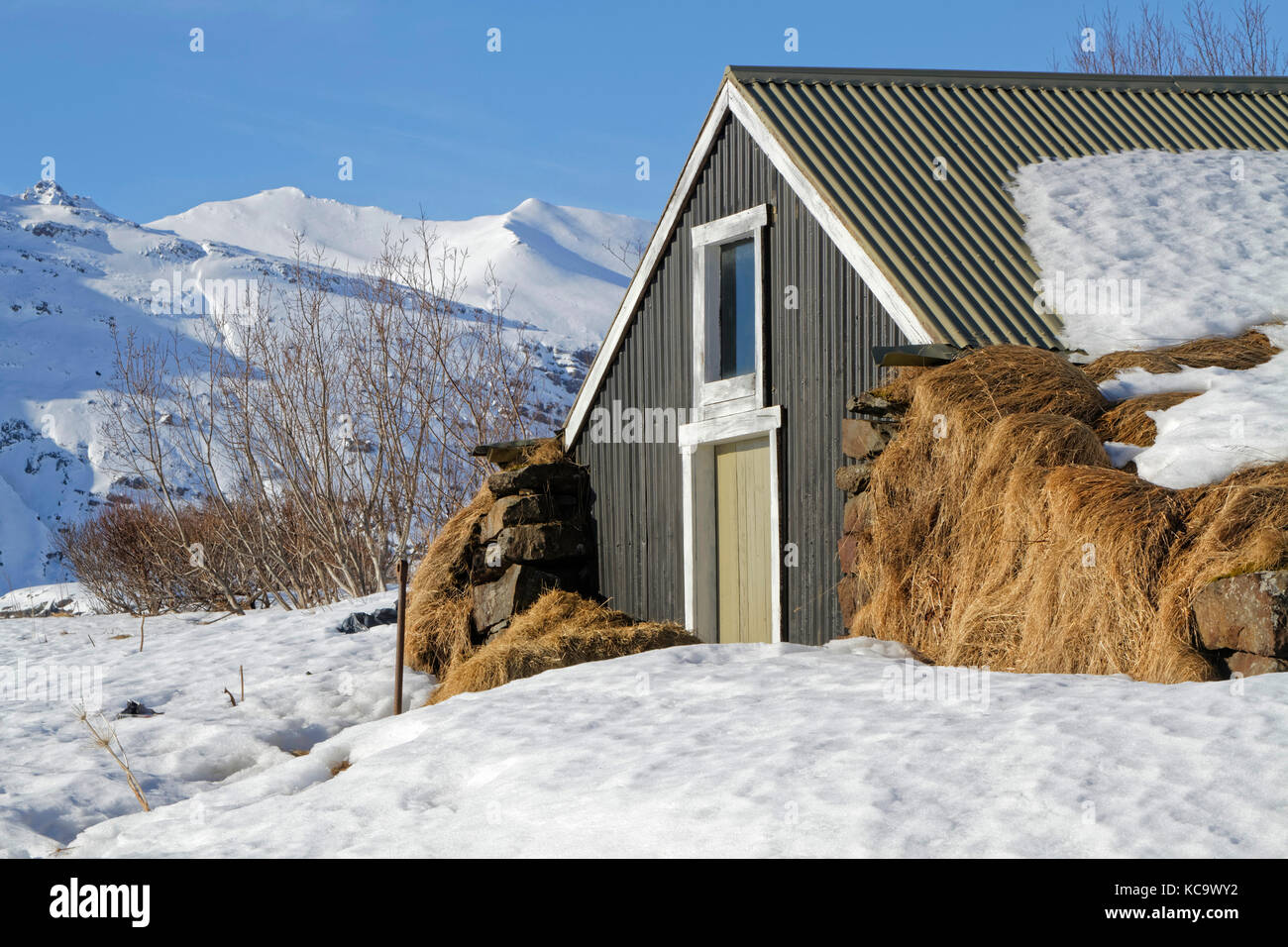 Small wooden house under the snow Stock Photo - Alamy