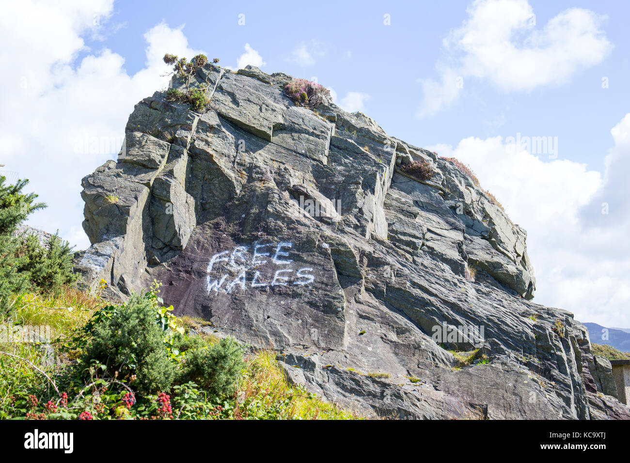 Free Wales graffiti on rock above the town of Barmouth Gwynedd Wales UK ...