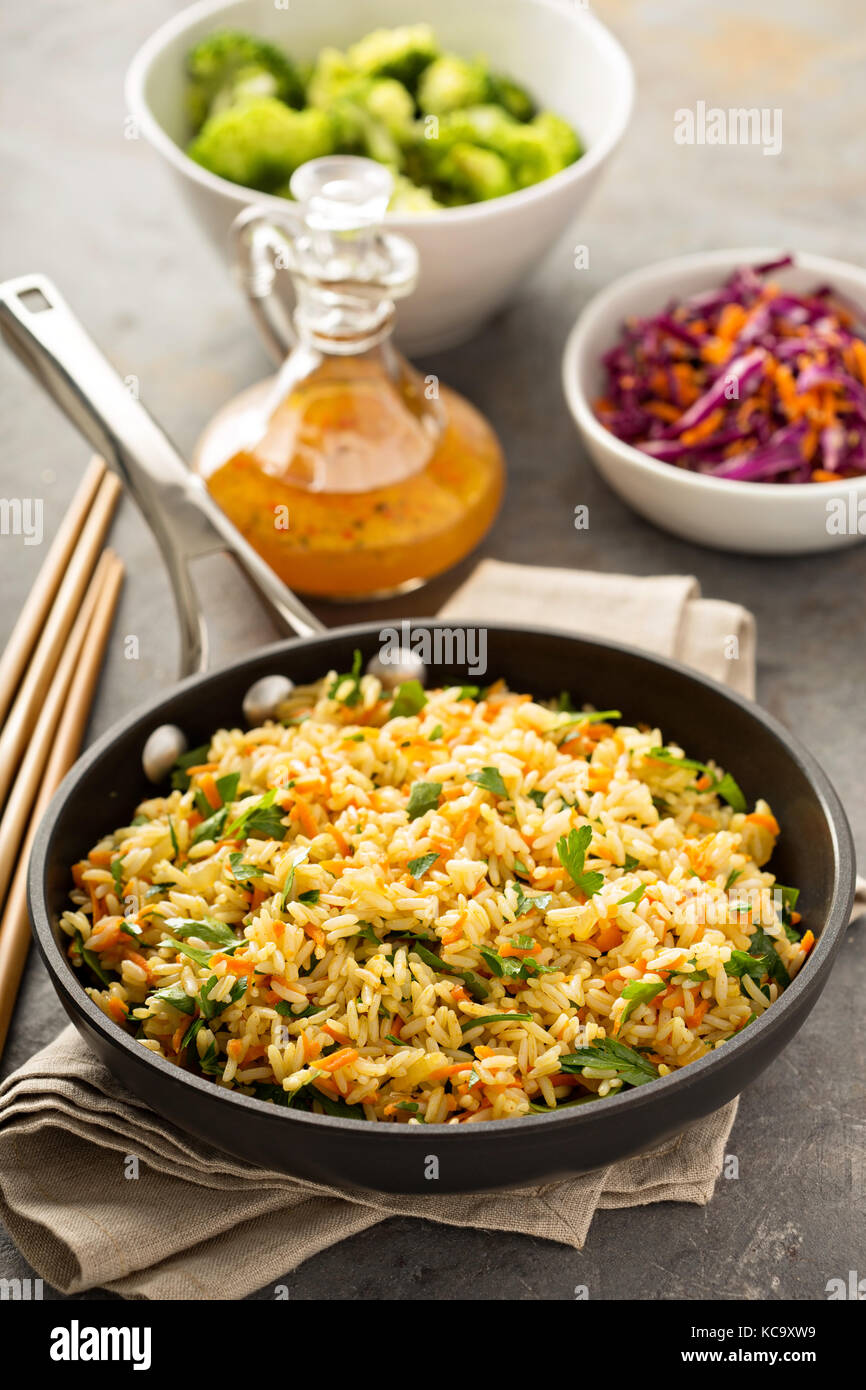 Fried rice with vegetables and steamed broccoli Stock Photo - Alamy