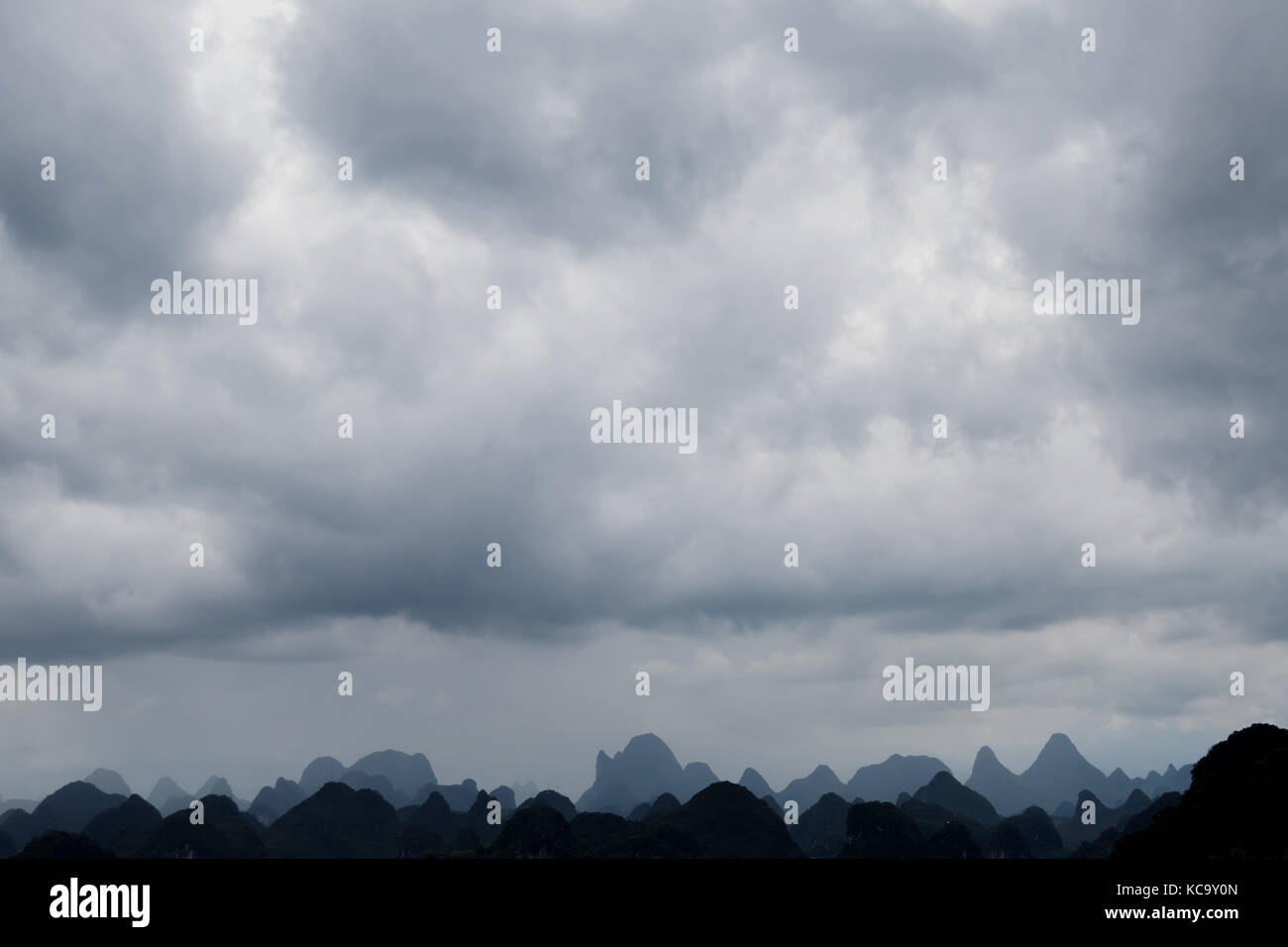 Beautiful Chinese natural landscape with karst hills, green mountains ...