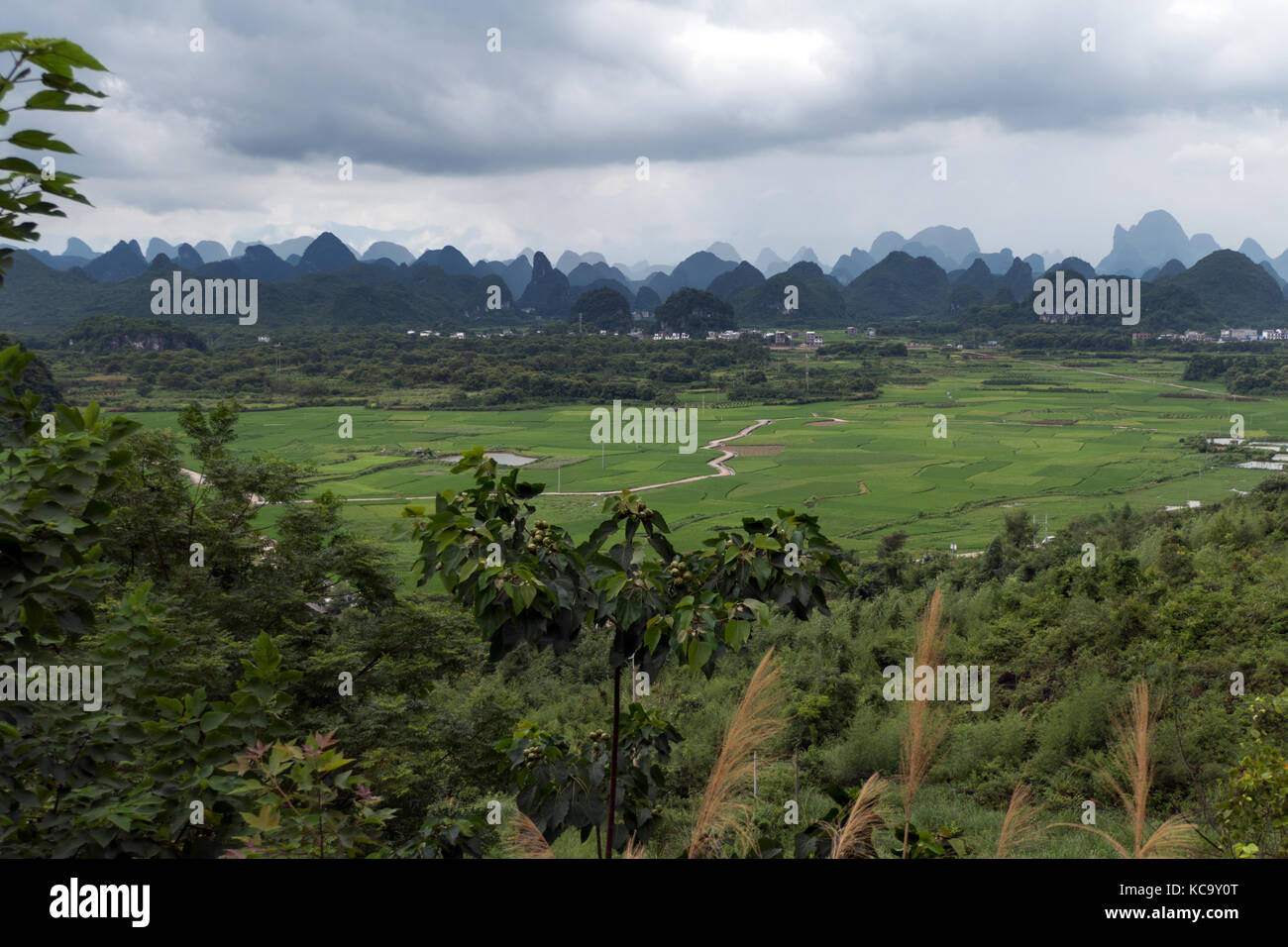 Beautiful Chinese natural landscape with karst hills, green mountains ...