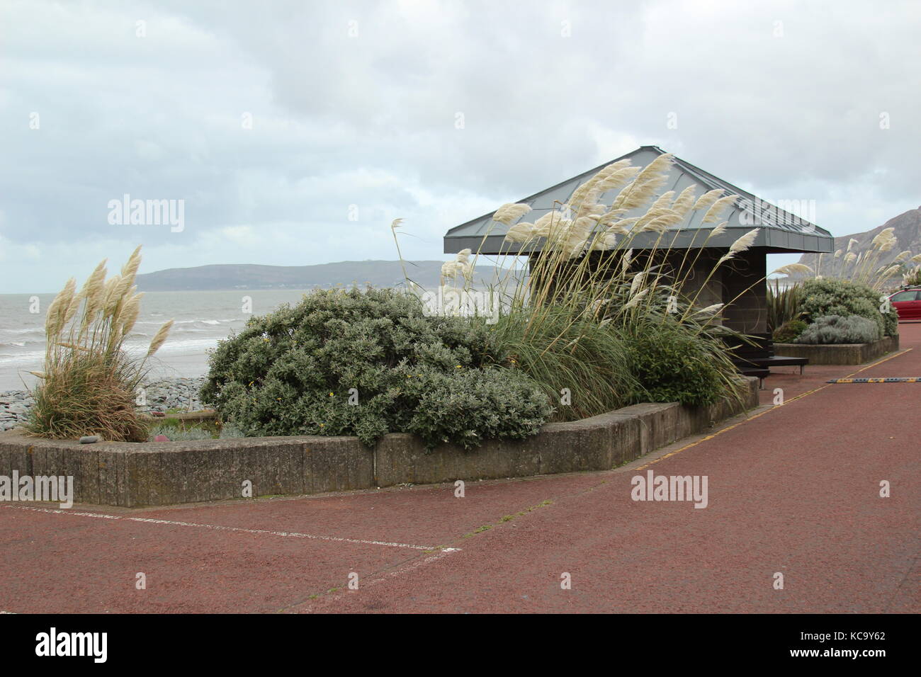 Penmaenmaer beach on a grey windy day Stock Photo - Alamy