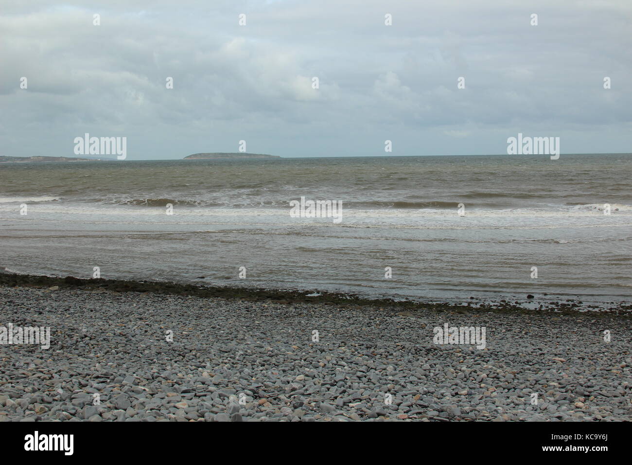 Penmaenmaer beach on a grey windy day Stock Photo - Alamy