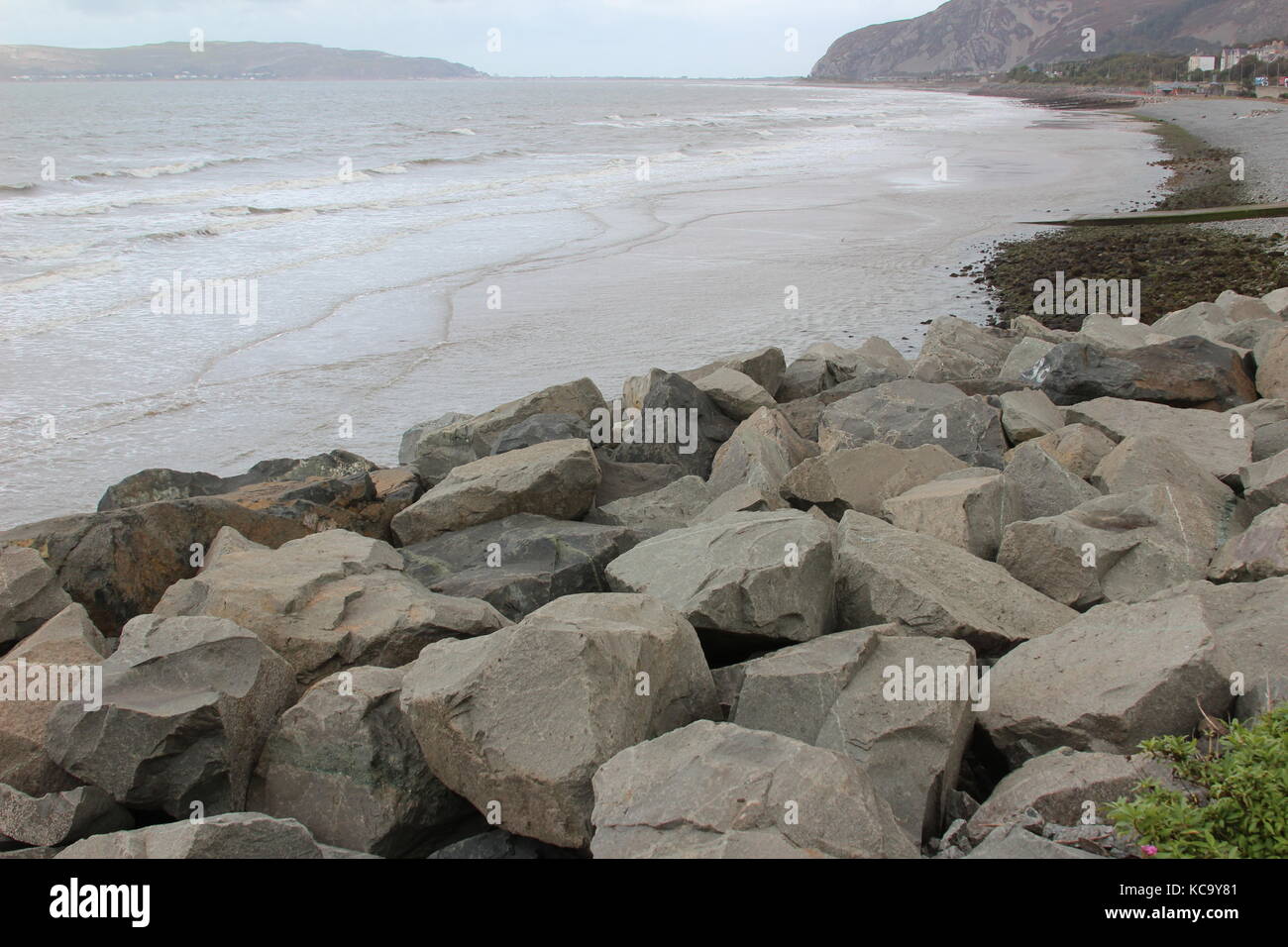 Penmaenmaer beach on a grey windy day Stock Photo - Alamy