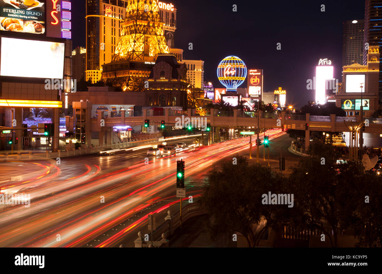 The Strip with Paris at Las Vegas main strip lights at night Stock ...