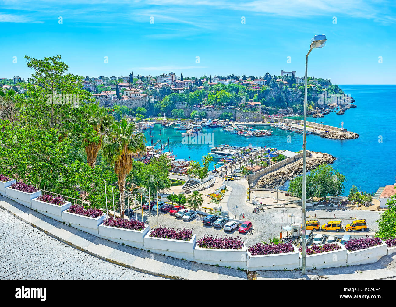 The walk in coastal neighborhood of Antalya with a scenic view on the ...