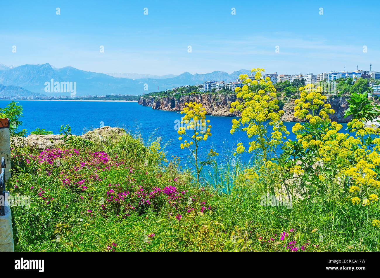 The beautiful seascape of Antalya from the tall cliff, covered with ...