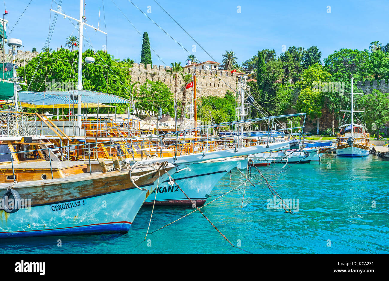 Old marina of Antalya with moored yachts and boats, rocking on the ...