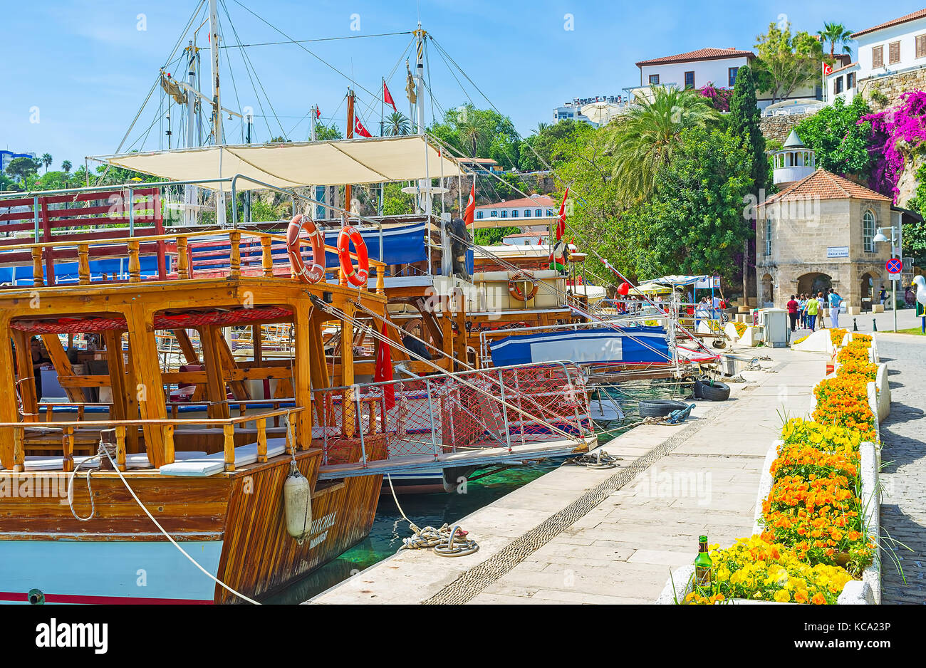 ANTALYA, TURKEY - MAY 12, 2017: The walk along the tourist boats in old ...