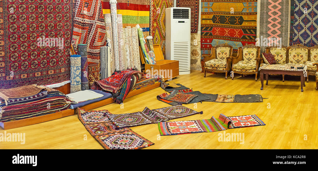 ANTALYA, TURKEY - MAY 12, 2017: Visit old traditional rug store with ...