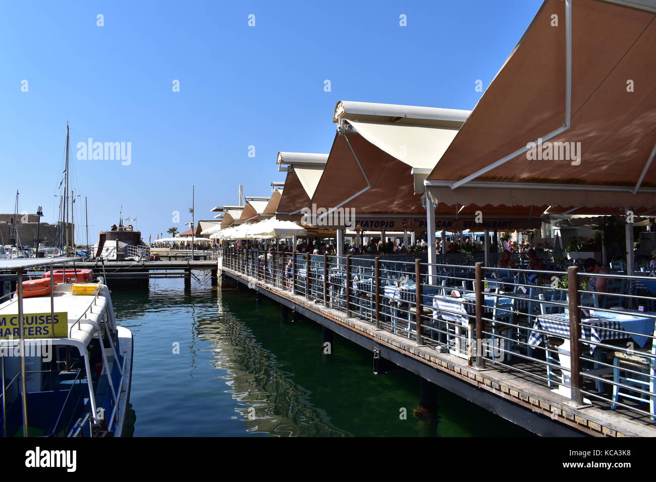 Paphos harbour, dominated by its medieval castle, on the Mediterranean ...