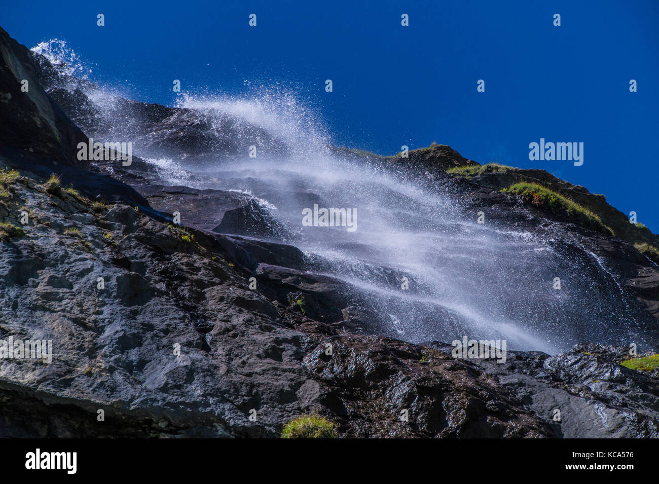 waterfall in the Swiss Alps Stock Photo - Alamy