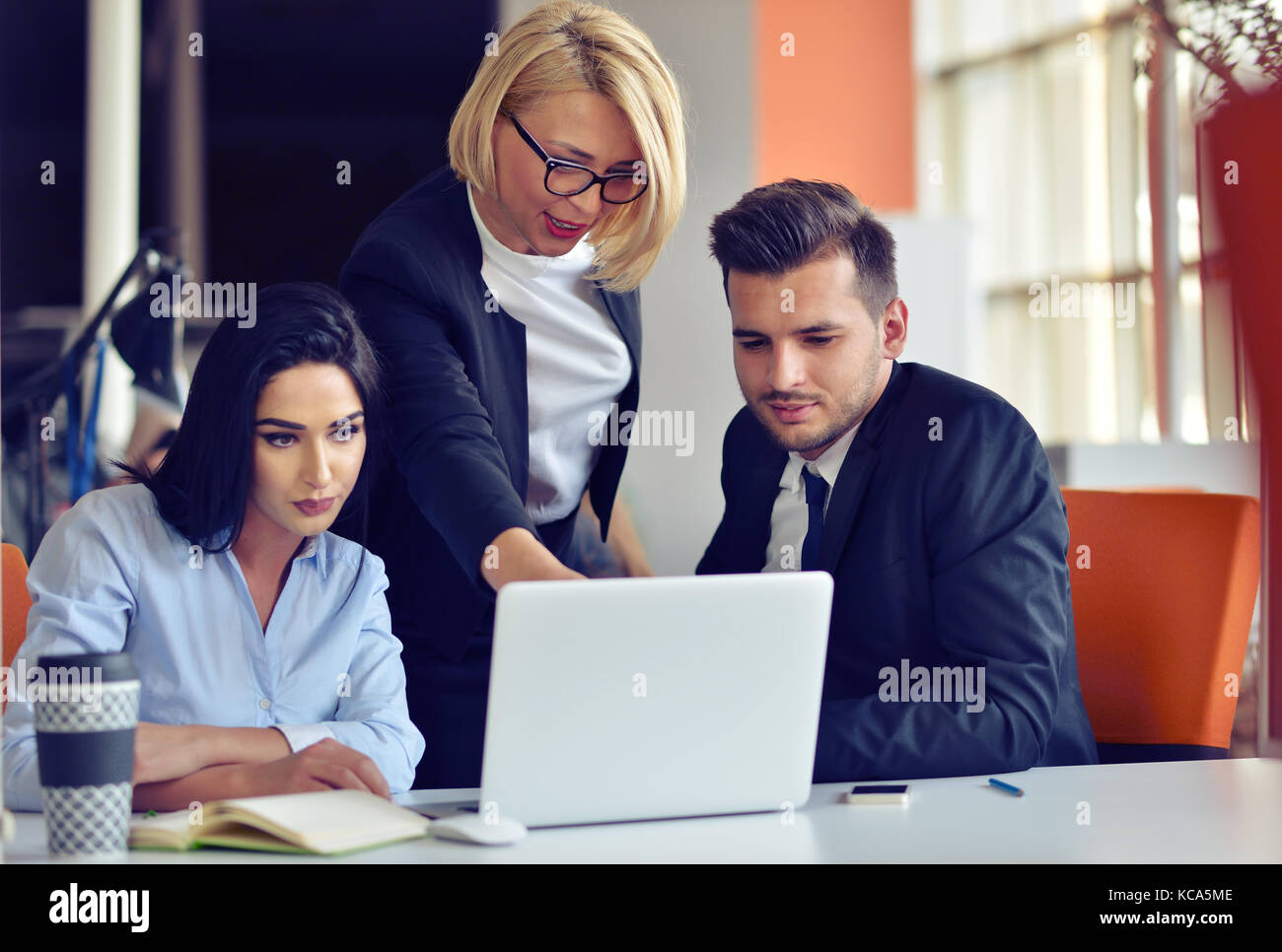 Team job. Photo young businessmans crew working with new startup ...