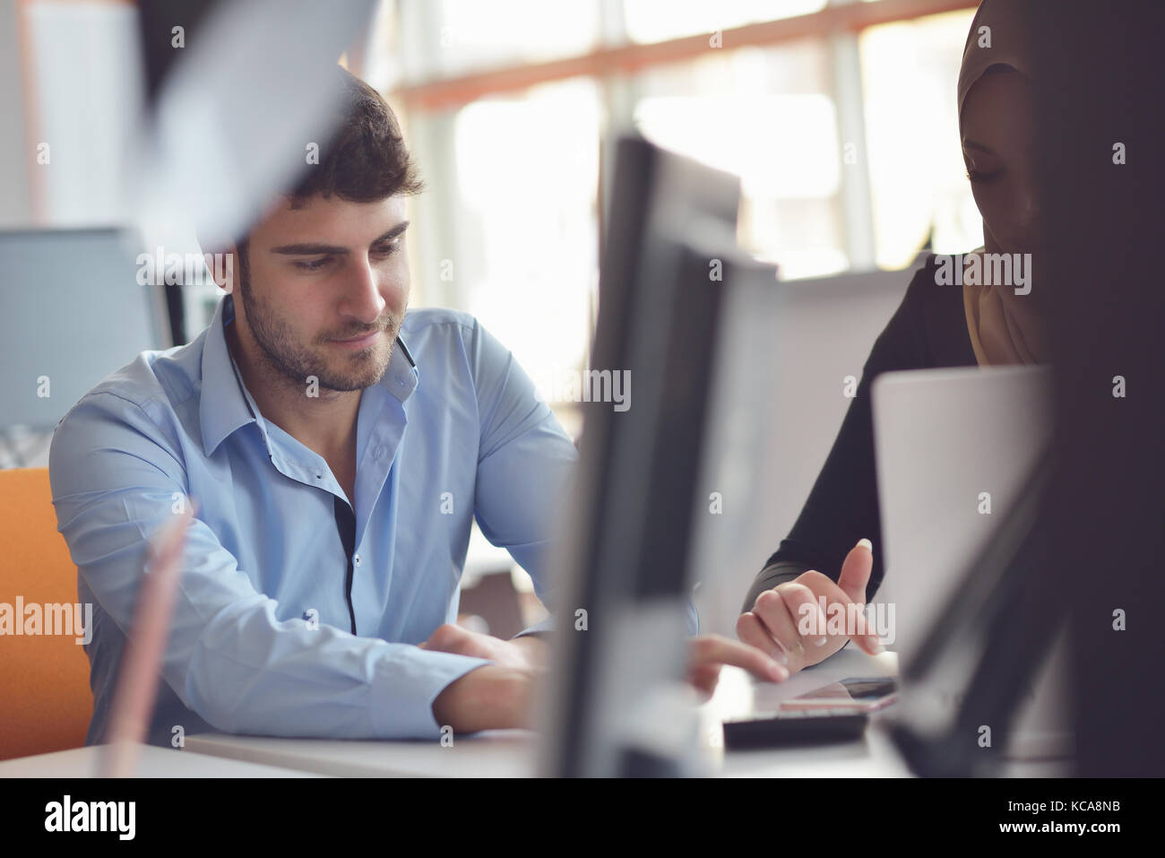 Freelance programmer working in startup office Stock Photo - Alamy