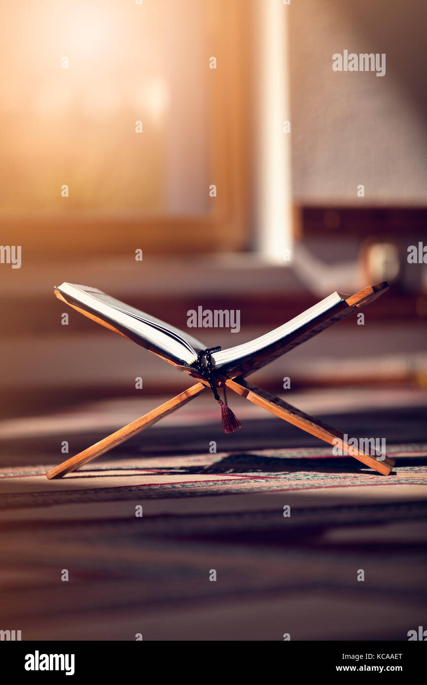 Quran in the mosque - open for prayers Stock Photo - Alamy