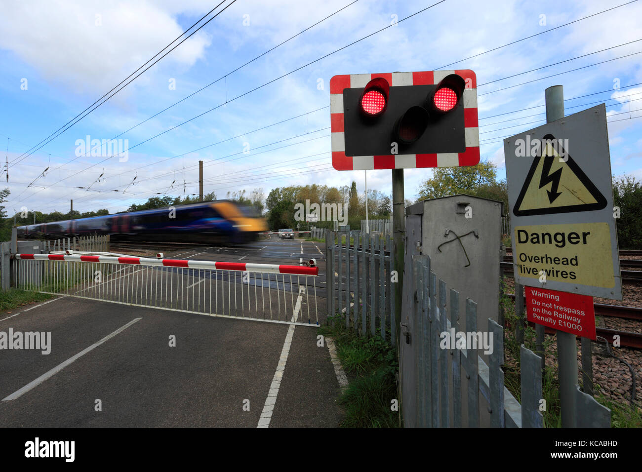 Train passing Red lights at an unmanned Level crossing, East Coast Main ...
