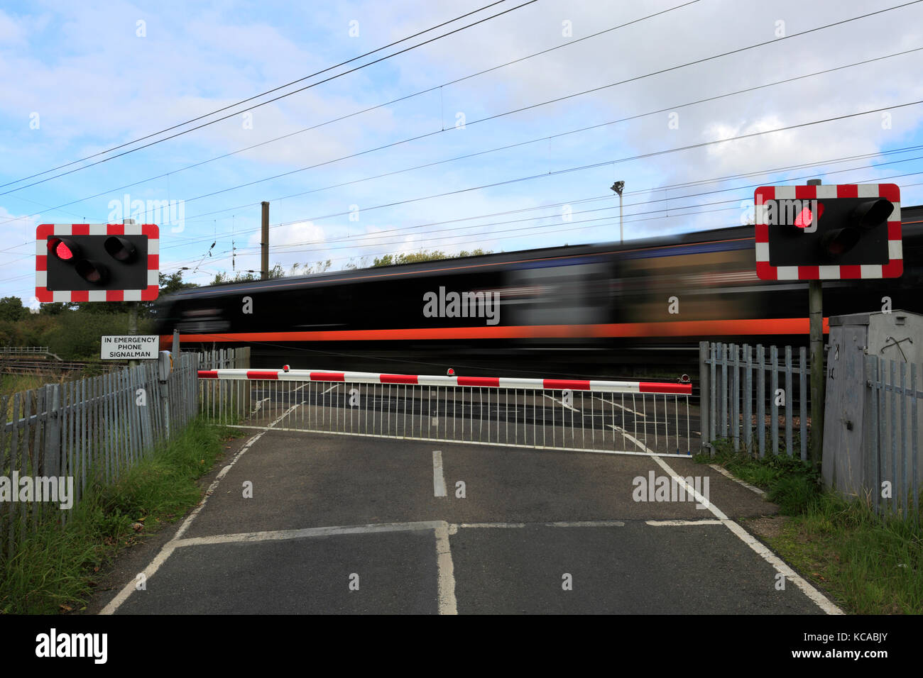 Train passing Red lights at an unmanned Level crossing, East Coast Main ...