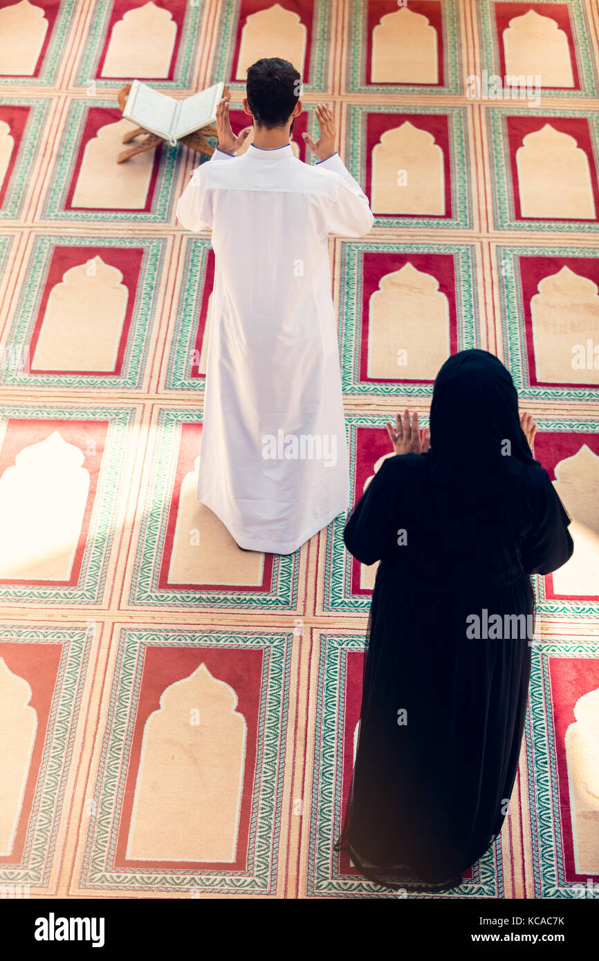 Muslim Couple Praying Together