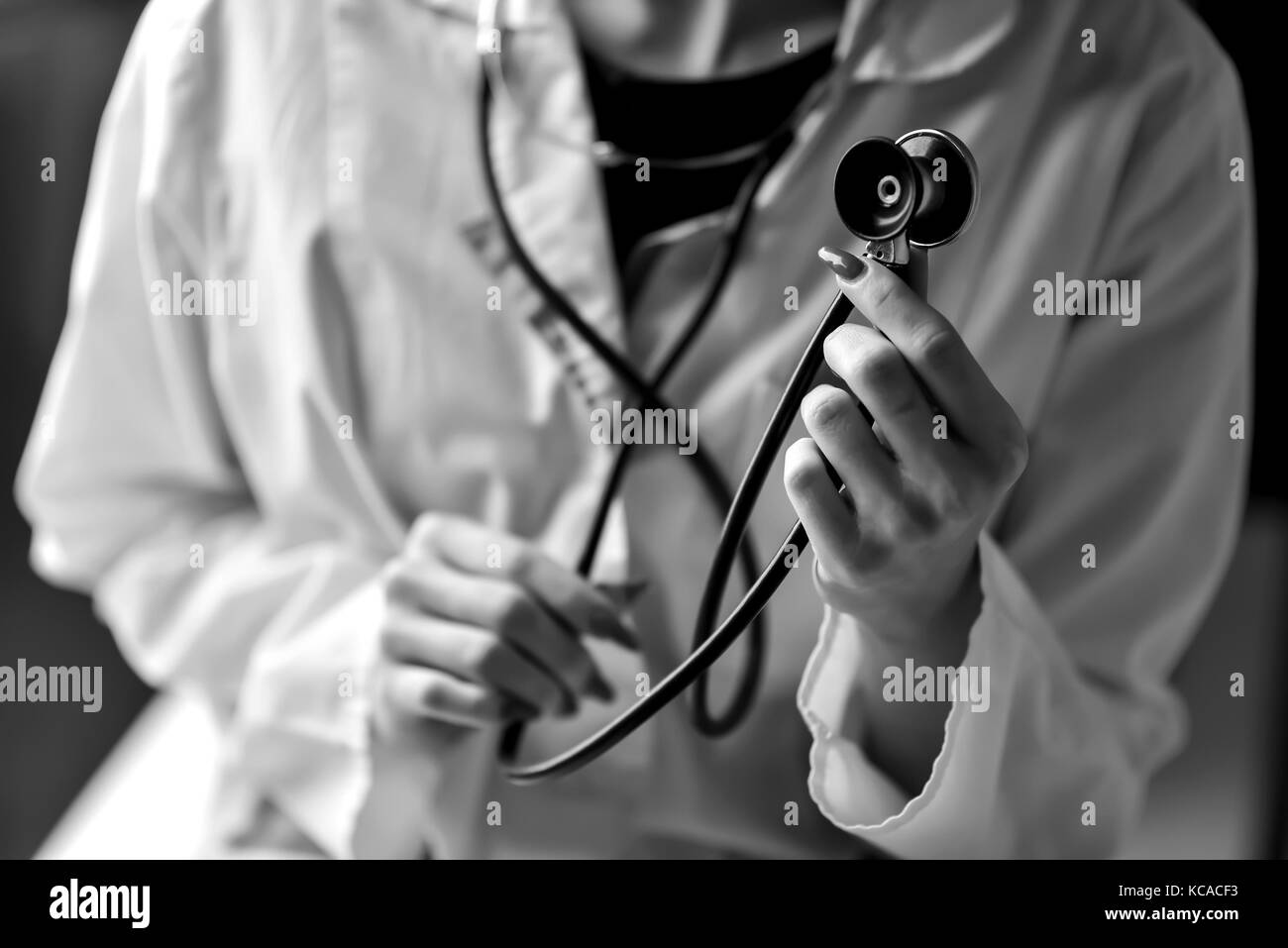 A stethoscope in the hands Stock Photo - Alamy