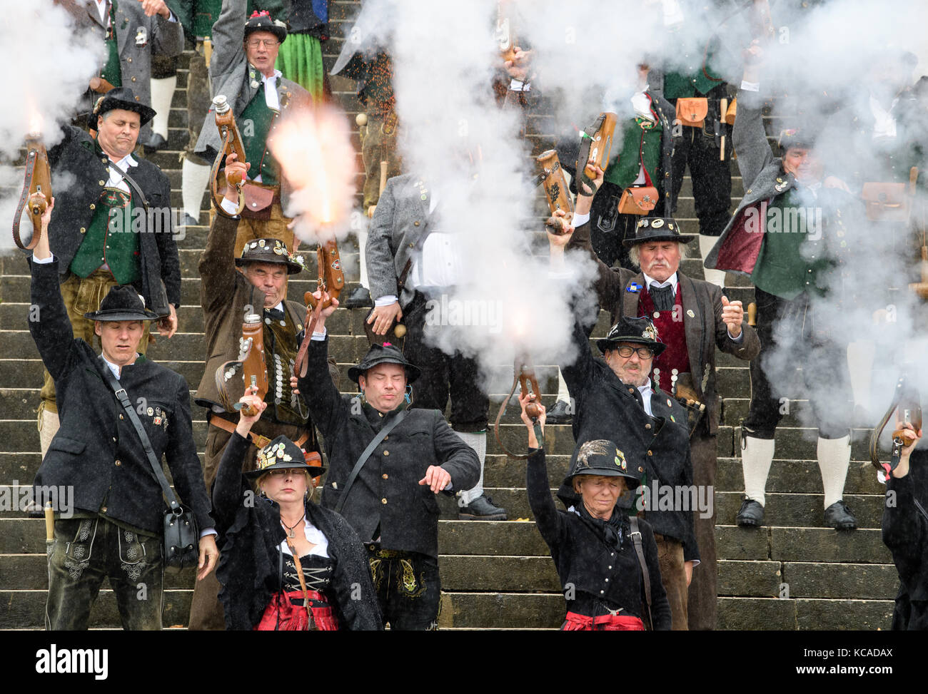 Munich, Germany. 03rd Oct, 2017. Gun shooters shoot in the air in front ...
